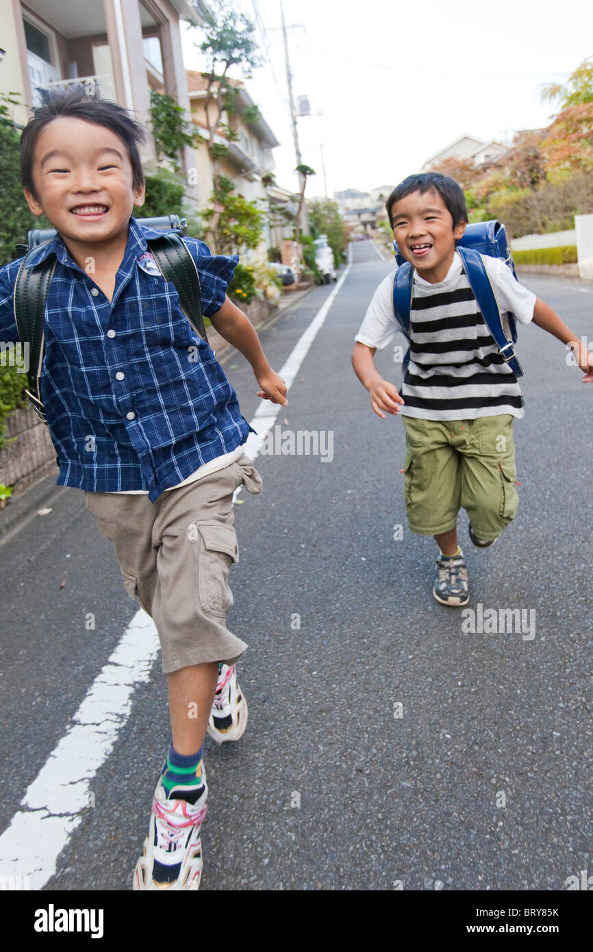 Boys running, Tokyo Prefecture, Honshu, Japan Stock Photo - Alamy