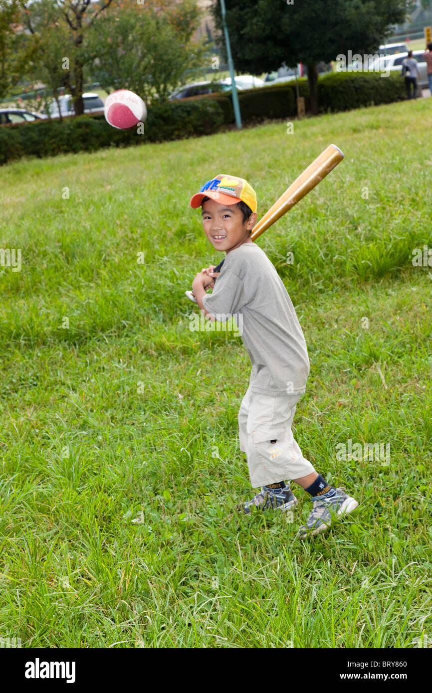 Boy playing baseball japan hi-res stock photography and images - Alamy