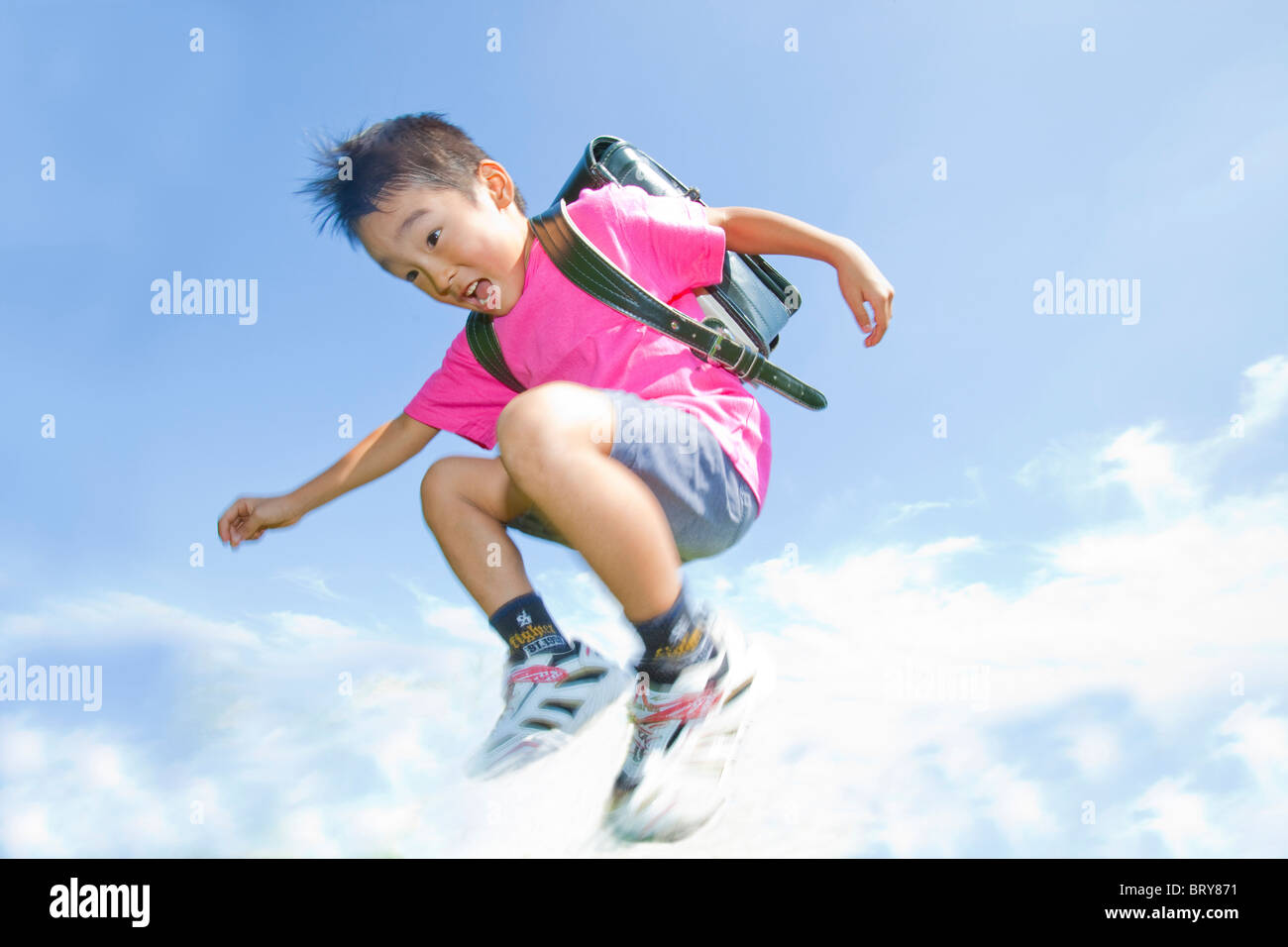 One boy jumping hi-res stock photography and images - Alamy