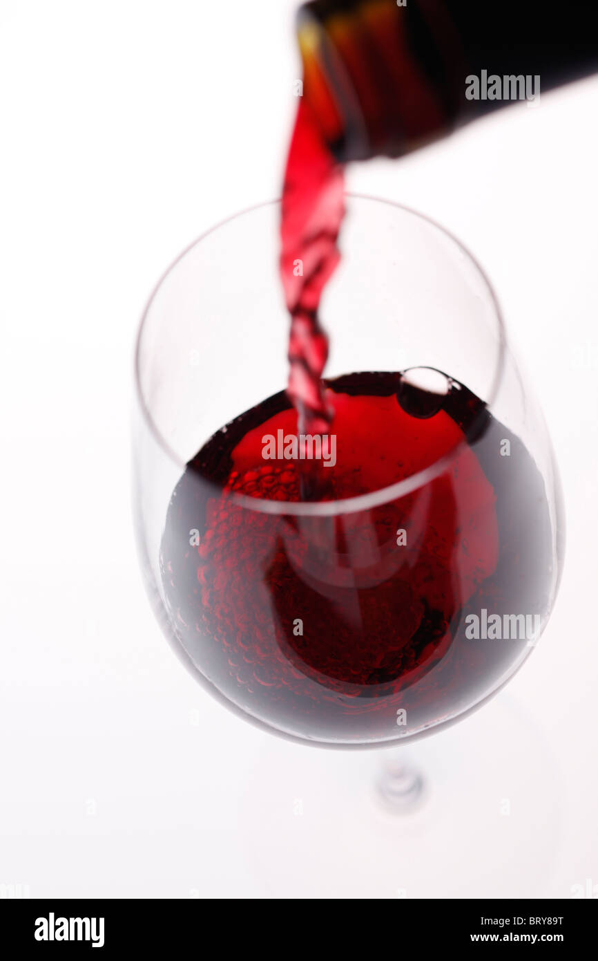 Red wine being poured into wineglass hi-res stock photography and ...