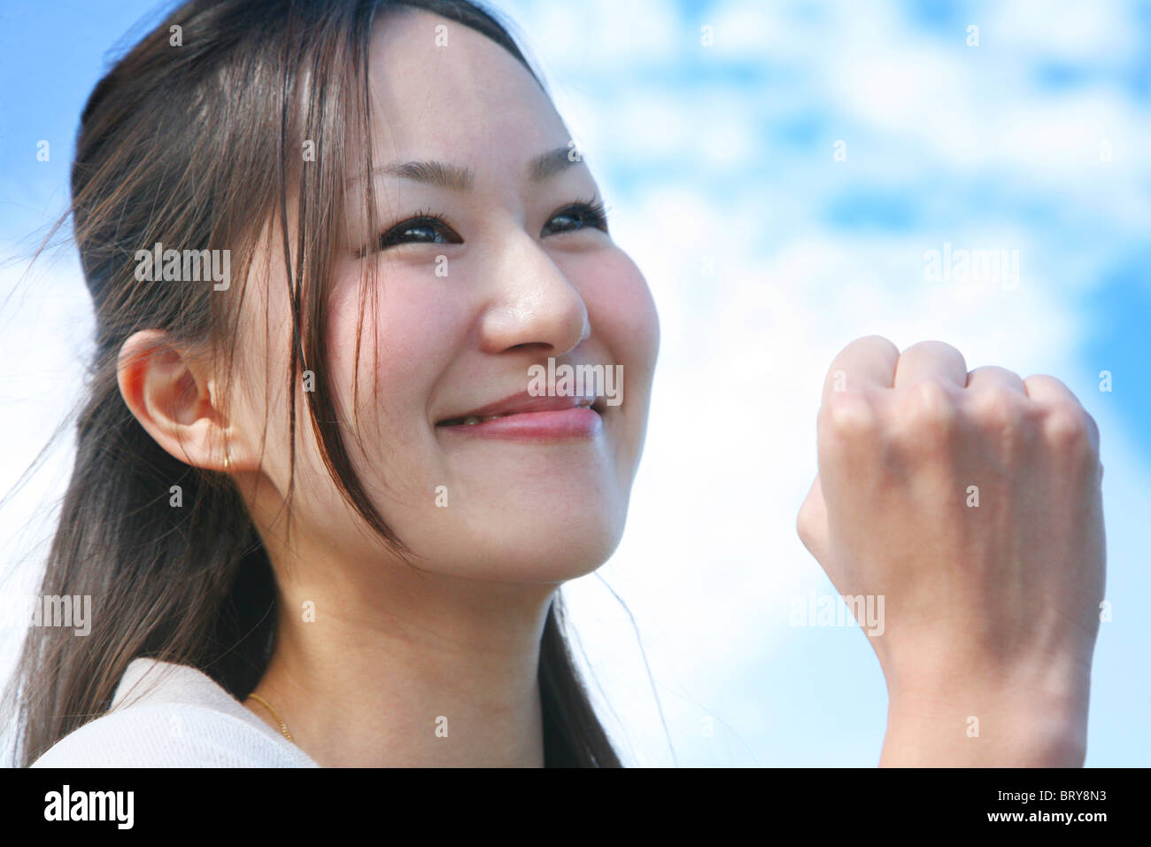 Young Woman with Victory Pose Stock Photo - Alamy