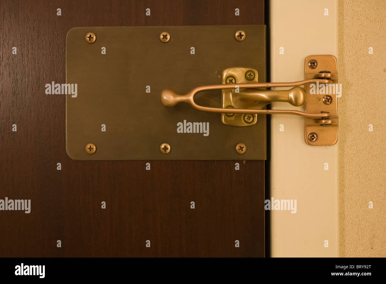 Close-up of latch on hotel door Stock Photo - Alamy