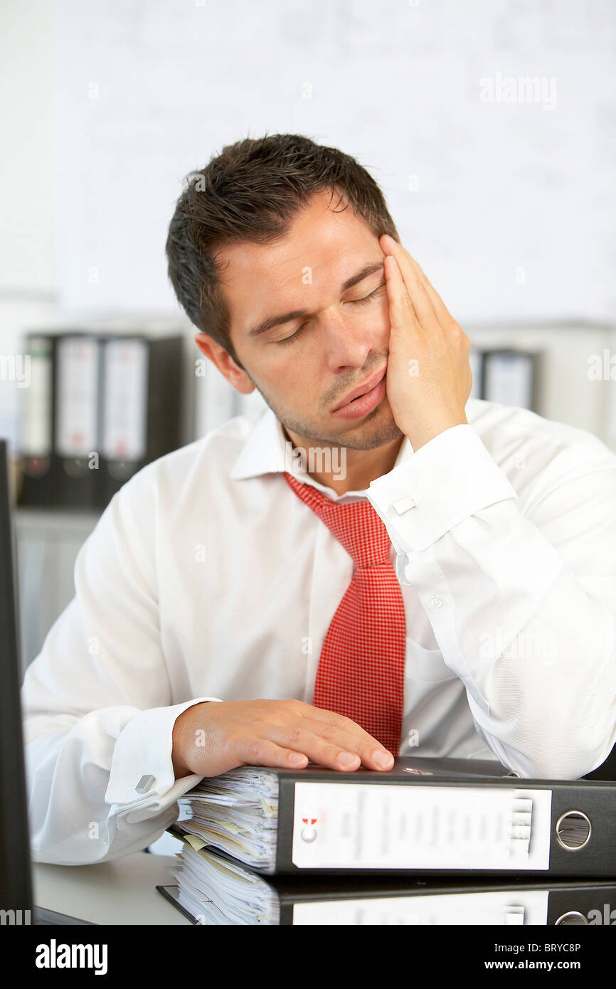 Man in office feeling dull hi-res stock photography and images - Alamy