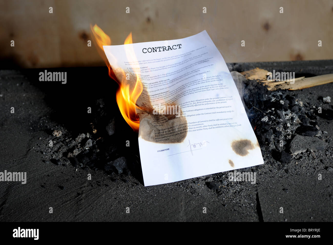 Burning contract Stock Photo - Alamy