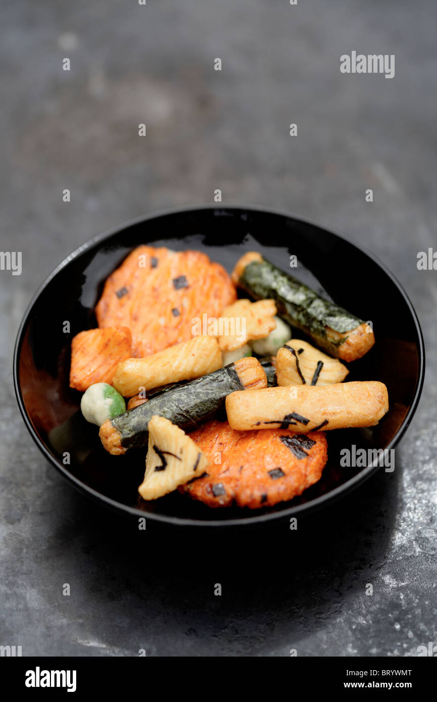 Close up of Japanese rice crackers in bowl Stock Photo - Alamy
