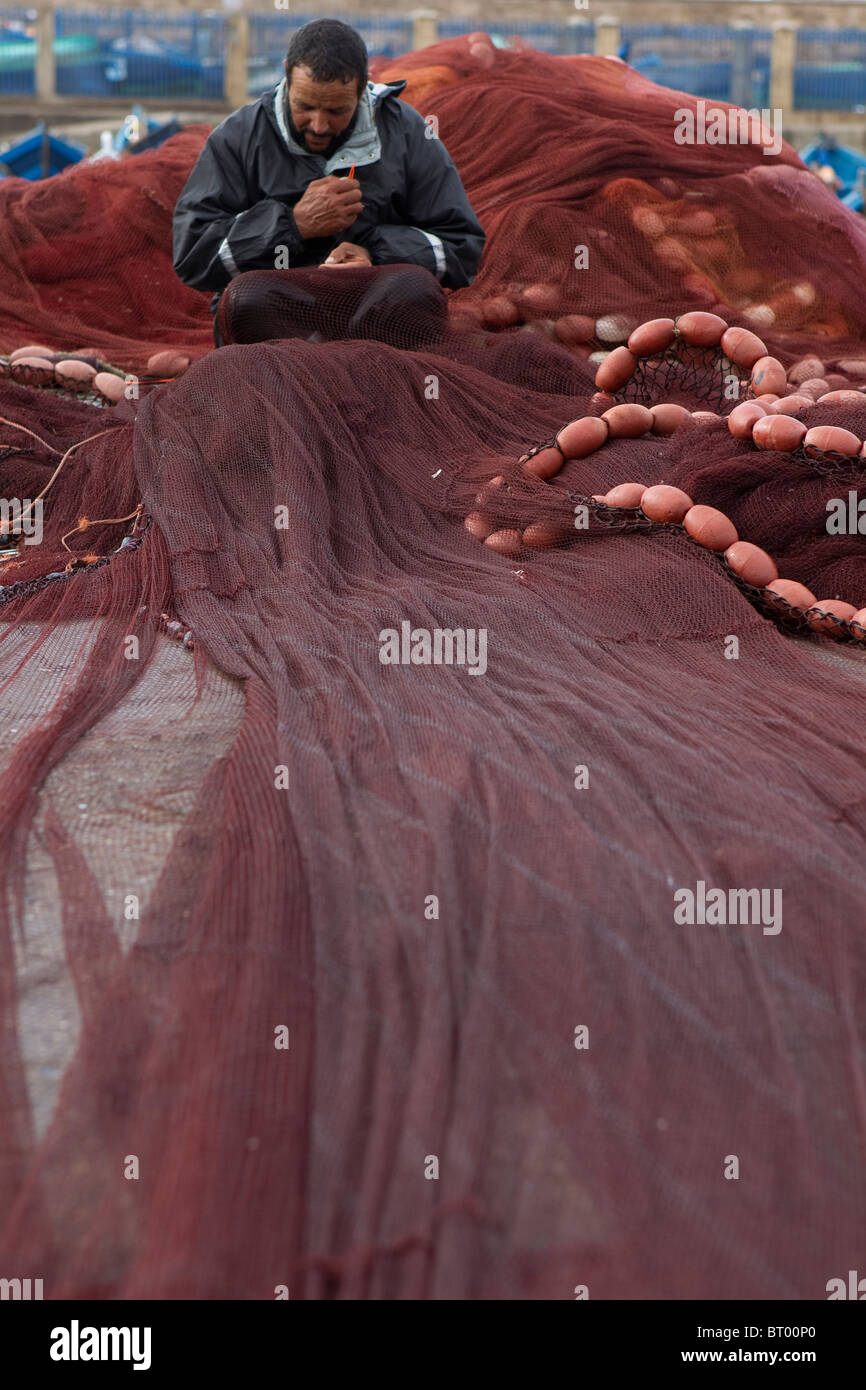 Mending the nets hi-res stock photography and images - Alamy