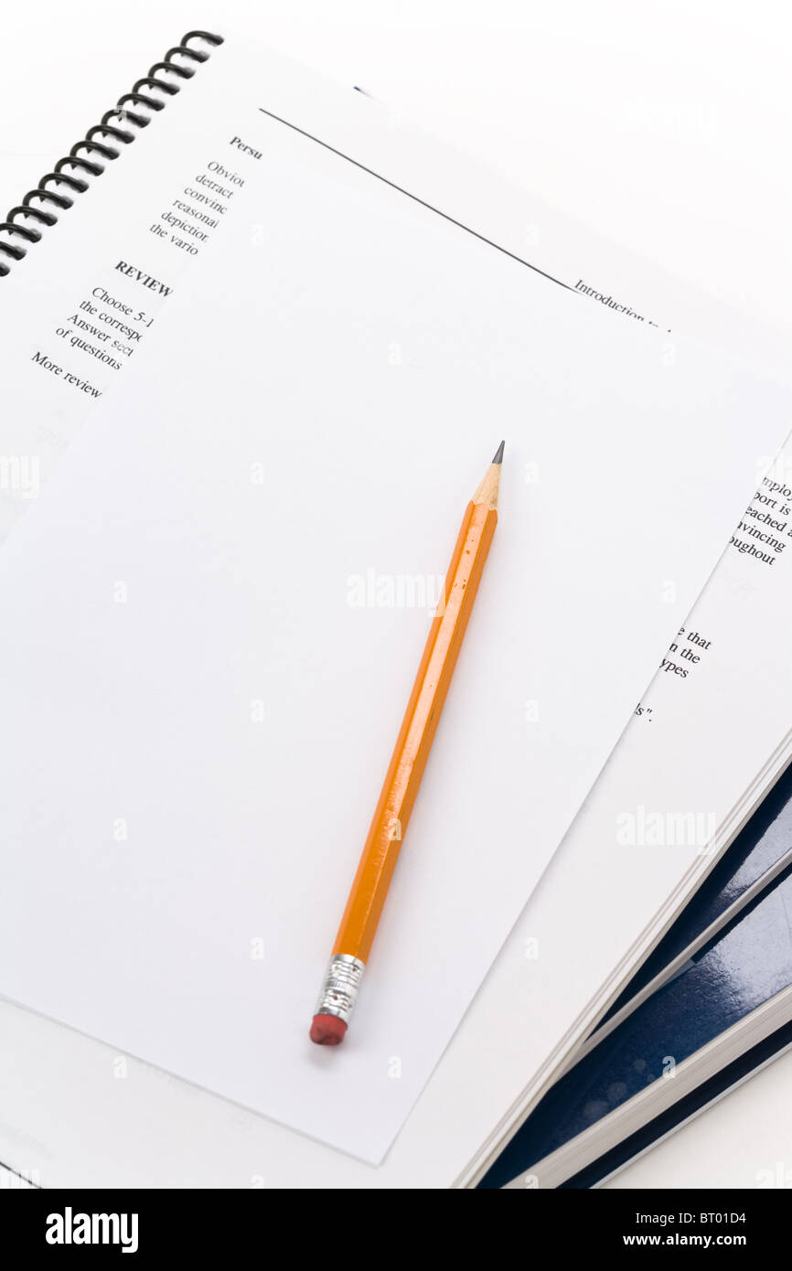 pencil and textbook close up Stock Photo - Alamy