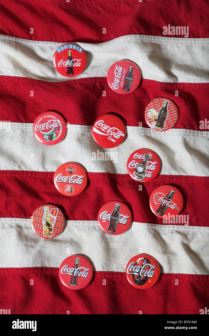 Coca-Cola badges pinned to an American flag Stock Photo - Alamy