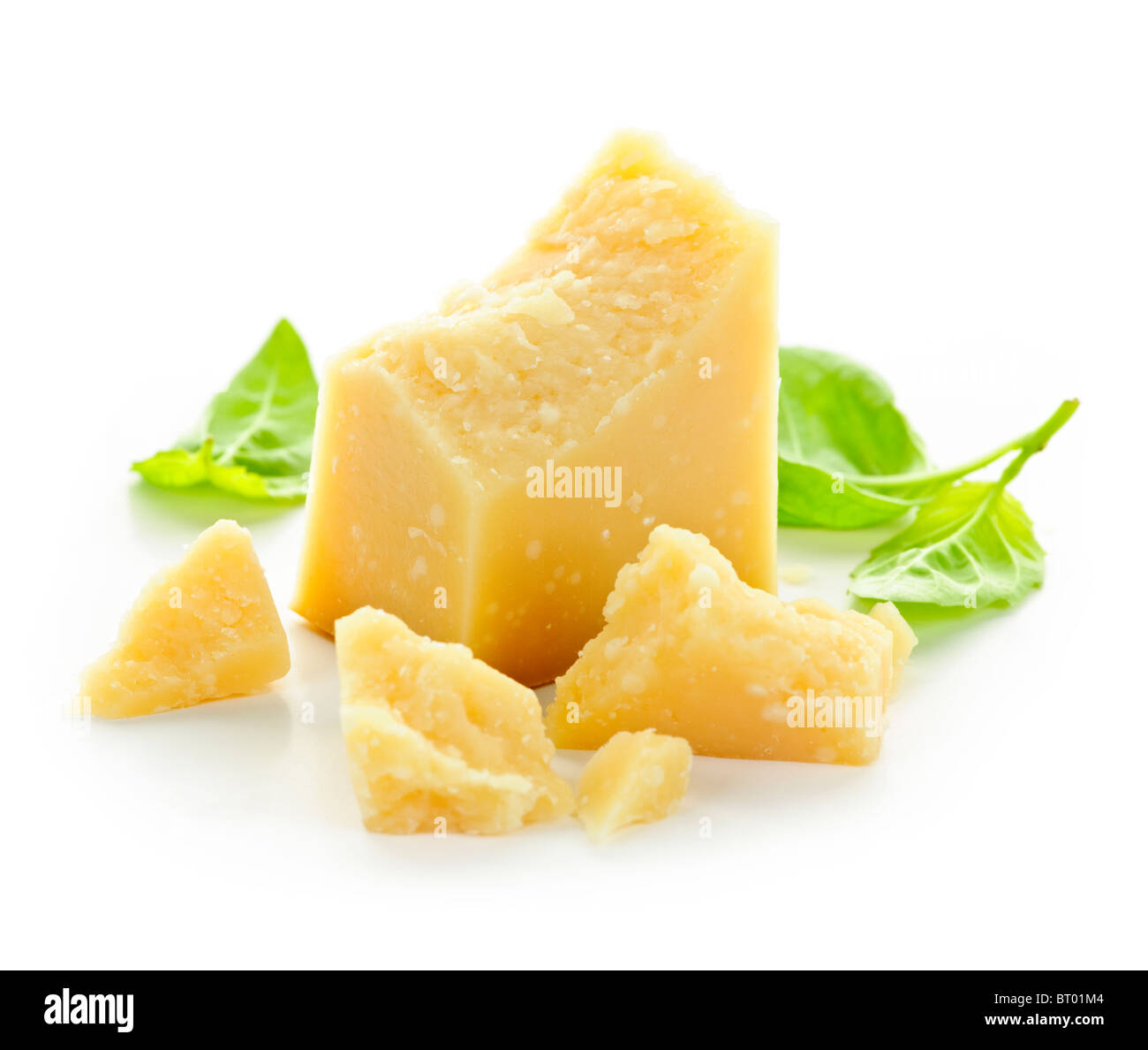 Parmesan cheese pieces closeup on white background Stock Photo - Alamy