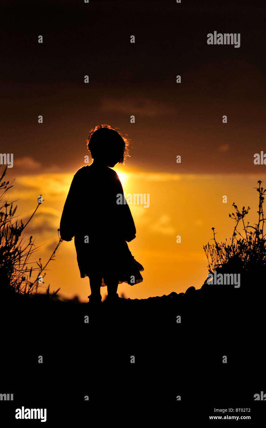 SILHOUETTE OF A LITTLE GIRL AT SUNSET, SOMME (80), PICARDY, FRANCE ...