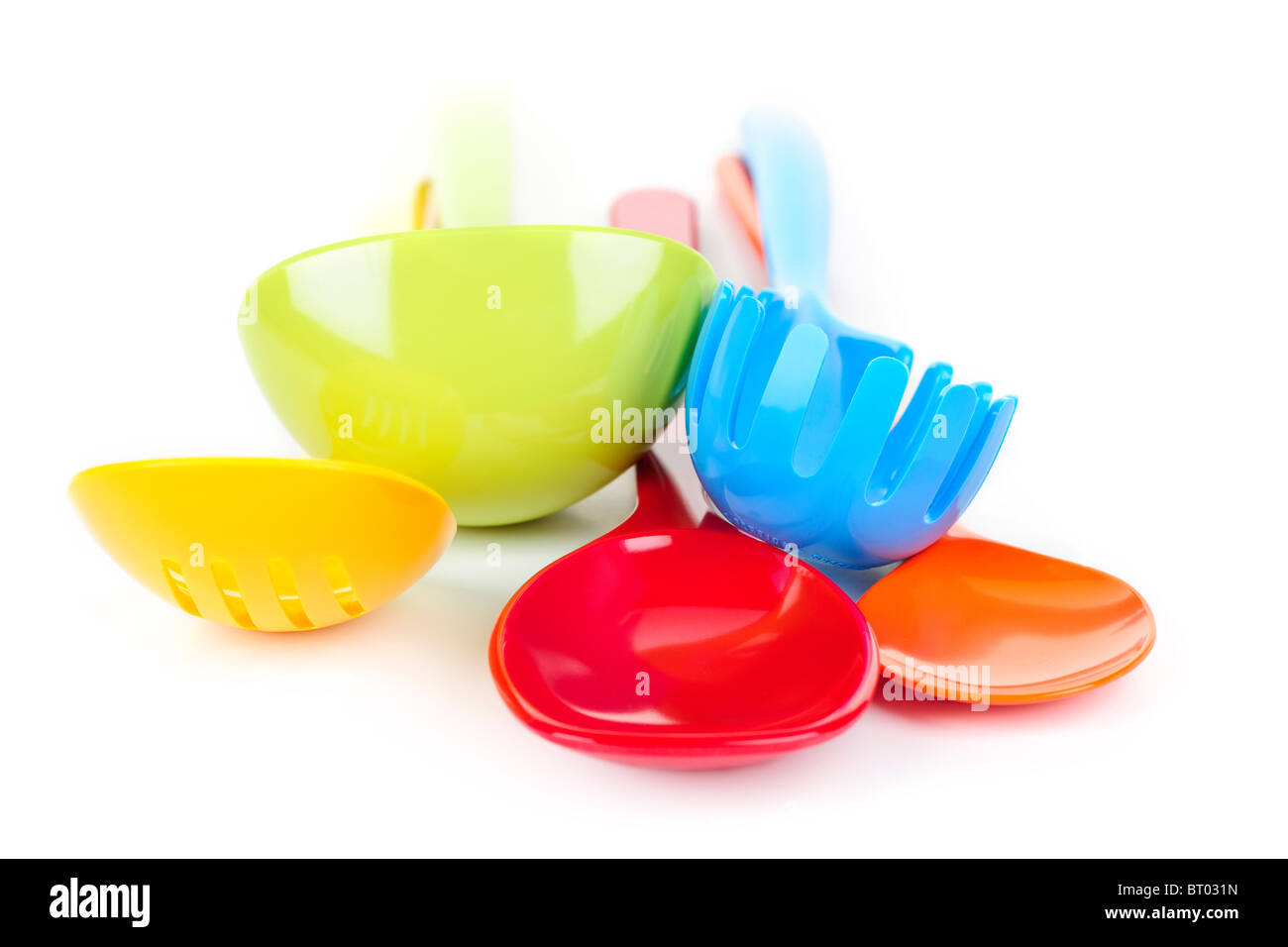 Various colorful plastic kitchen utensils on white background Stock ...