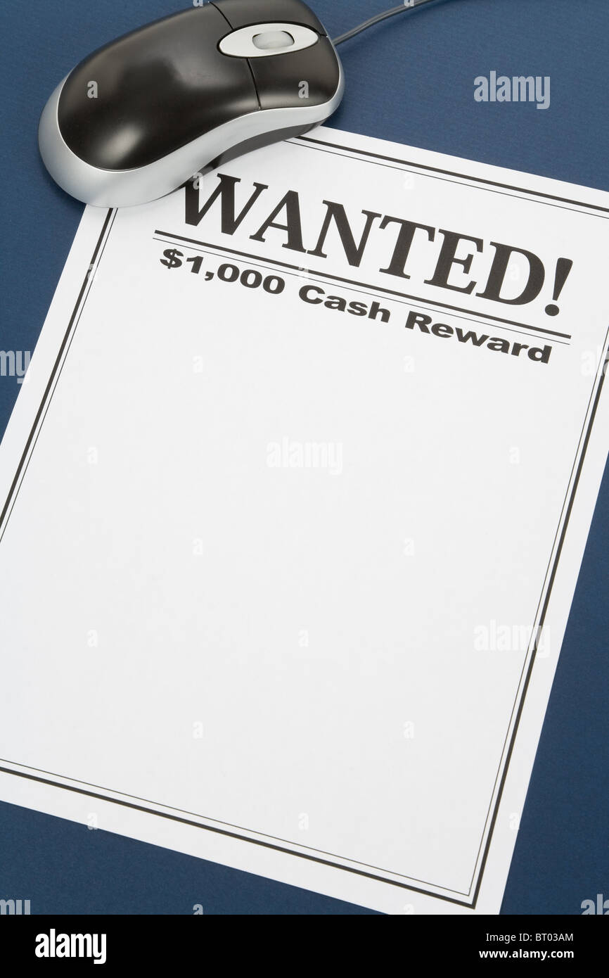 computer mouse and wanted poster, online searching Stock Photo - Alamy