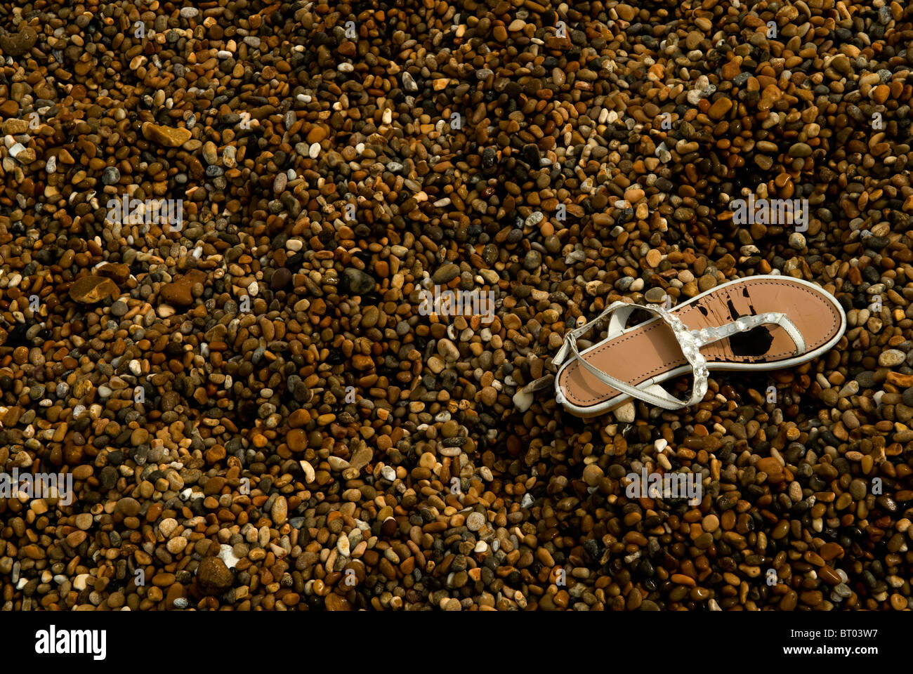 Washed up shoe on the beach hi-res stock photography and images - Alamy