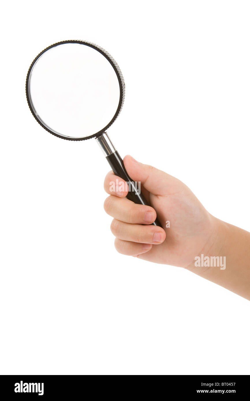 child's hand holding a magnifier Stock Photo - Alamy