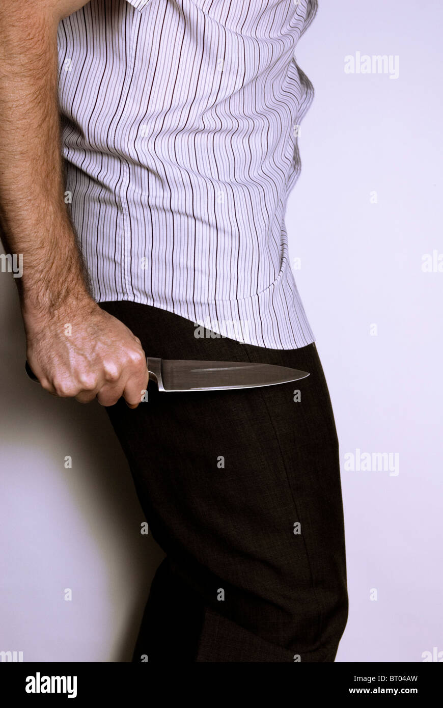 Man holding knife on white background with space for text Stock Photo ...