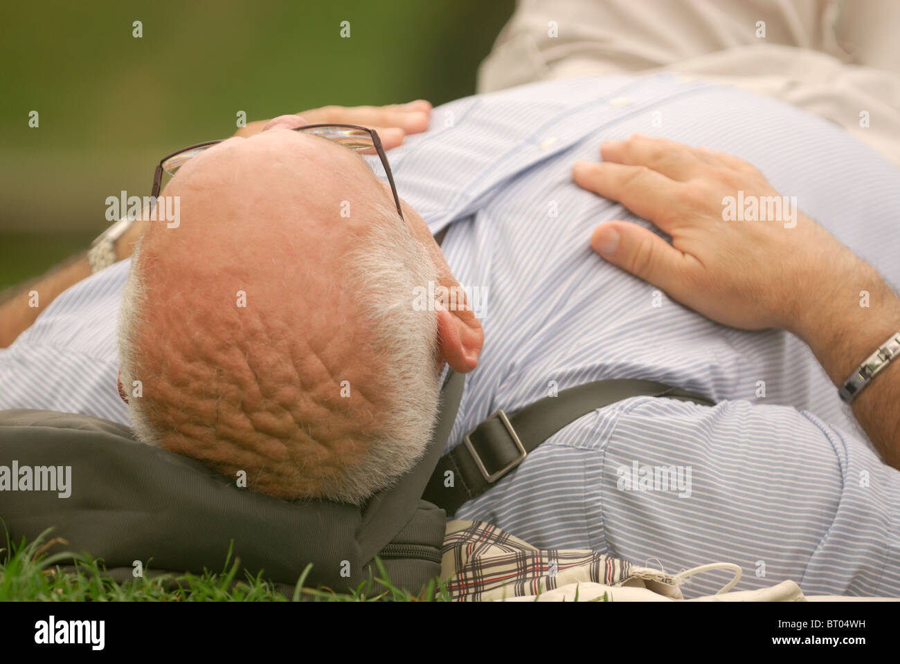 Elderly man laying on back hi-res stock photography and images - Alamy