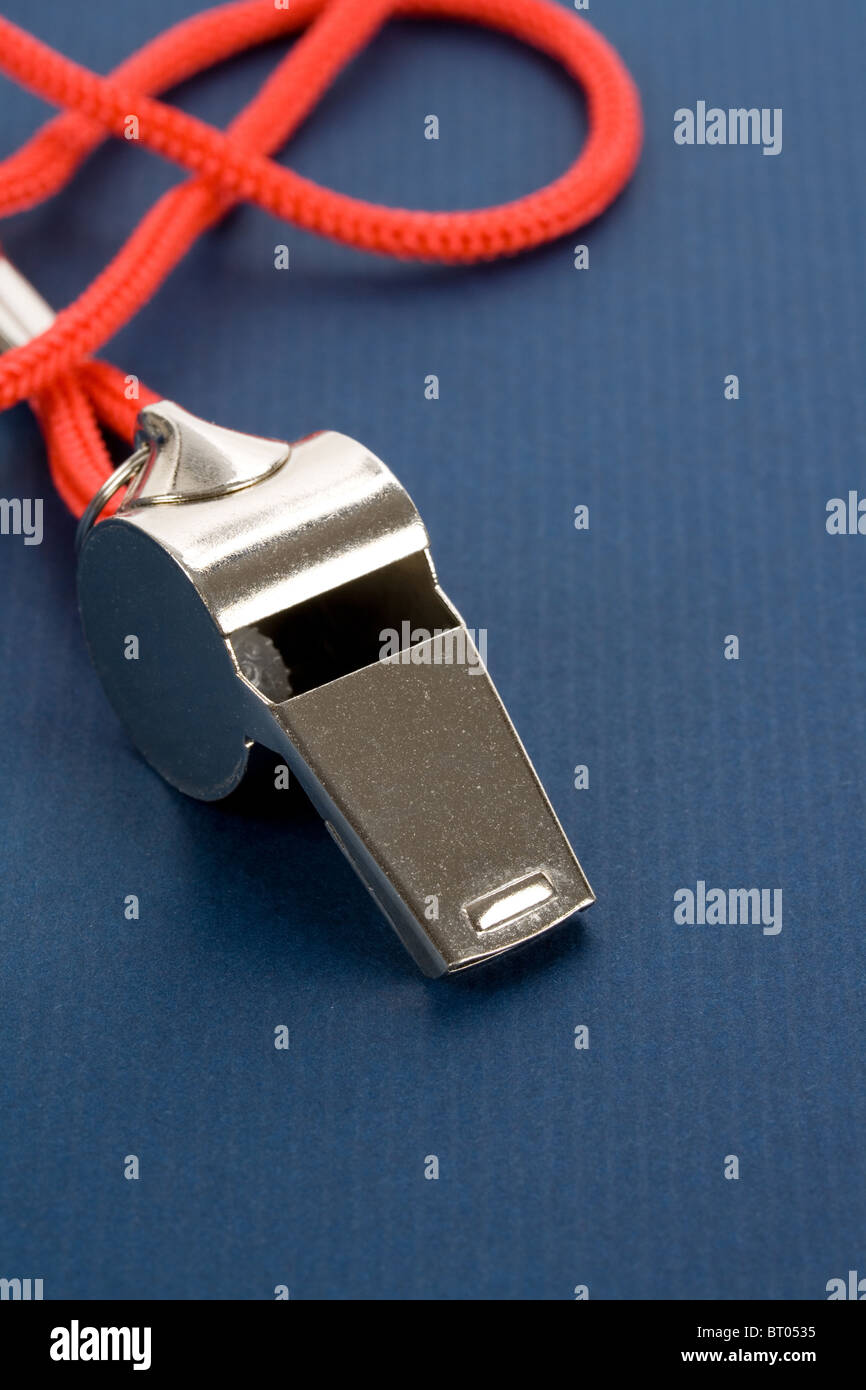 a whistle with blue background Stock Photo - Alamy