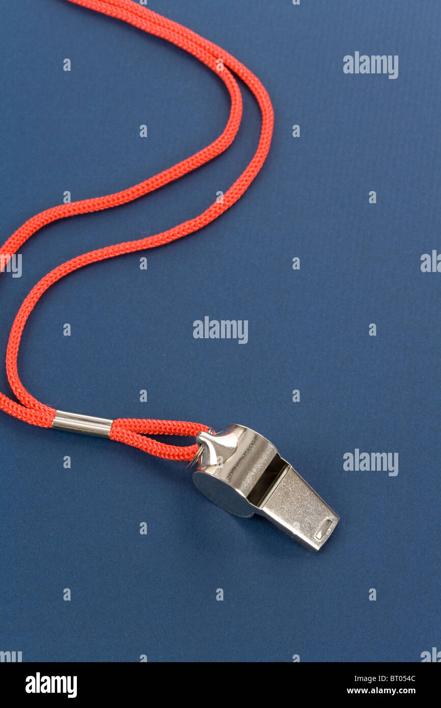 a whistle with blue background Stock Photo - Alamy