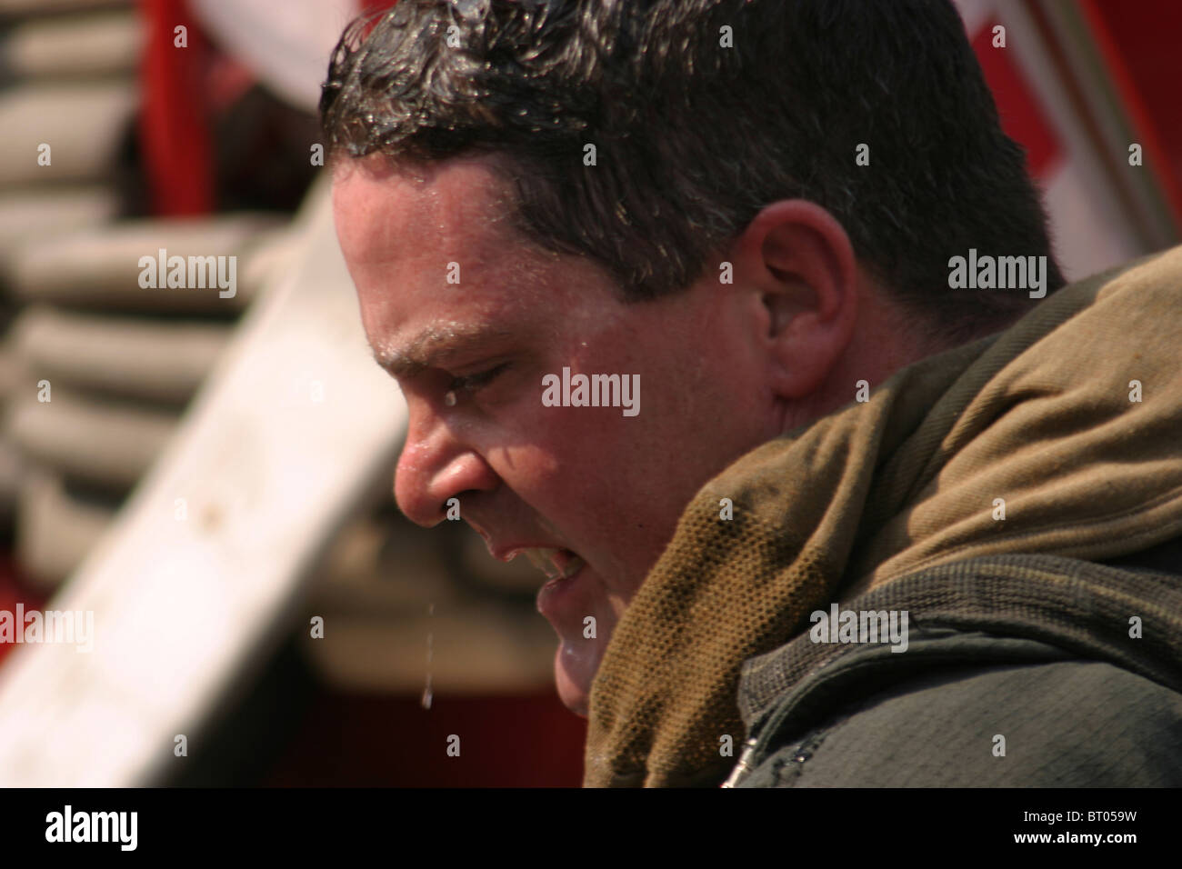 FDNY Fire Fighter sweating Stock Photo - Alamy