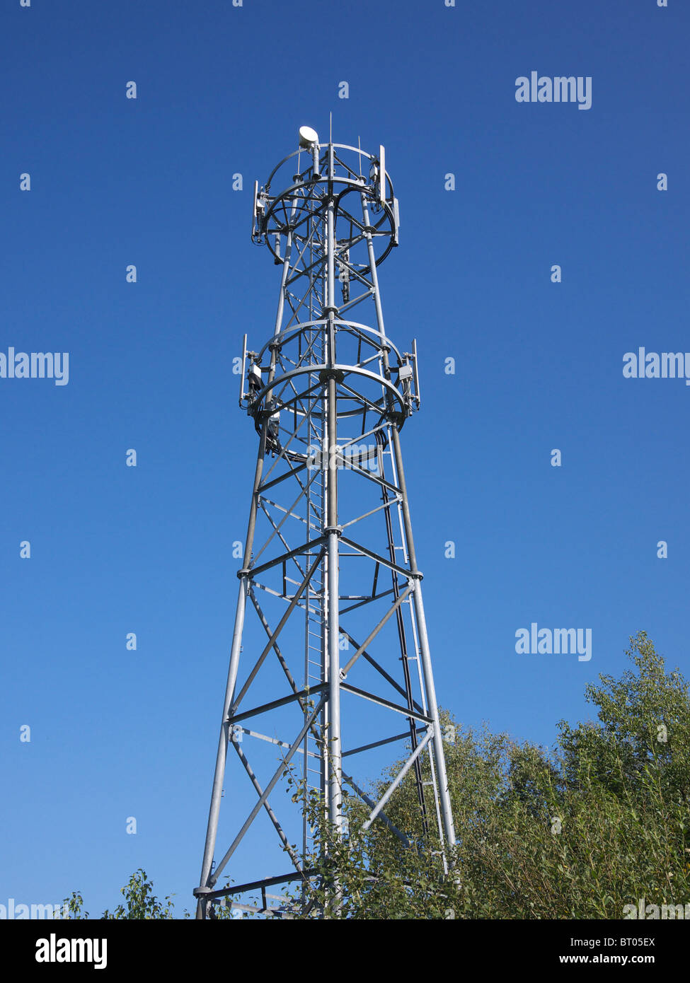Telecommunications tower and mobile phone mast, England, UK Stock Photo ...