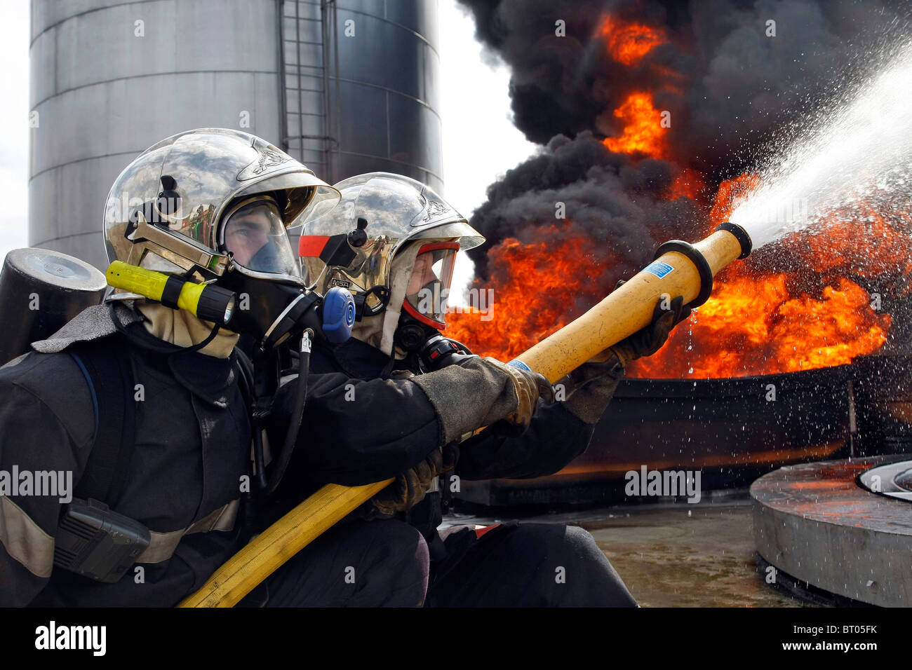 TRAINING IN EXTINGUISHING A HYDROCARBON FIRE, DEPARTMENTAL FIREFIGHTERS ...