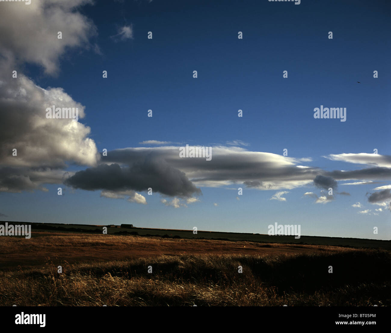 Dark dramatic cloud over Embleton Bay Embleton Northumberland England ...