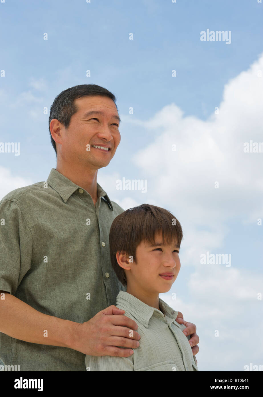 Smiling father and son Stock Photo - Alamy