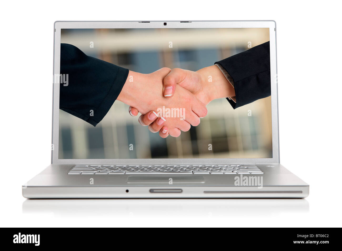 A modern silver computer on a white background, Handshaking on the ...