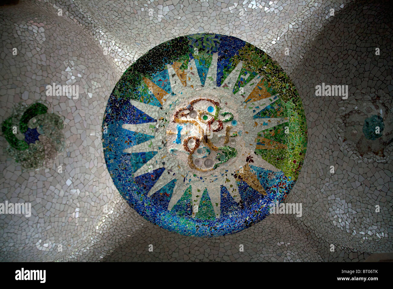 Round mosaic detail, part of the architecture Park Guell by Antoni ...