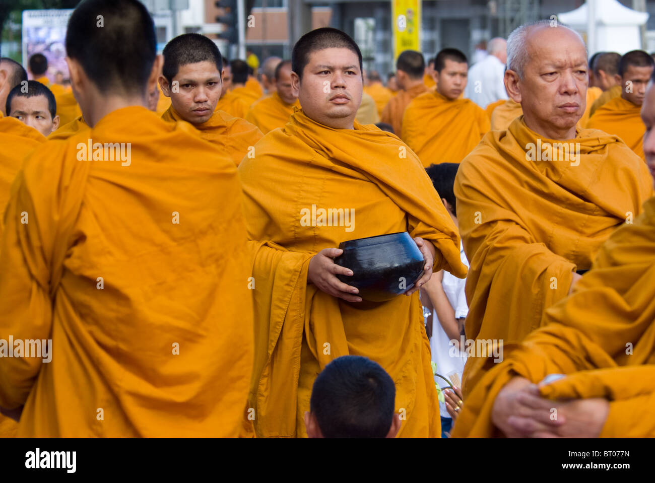 Procession of Monks collecting alms Stock Photo - Alamy