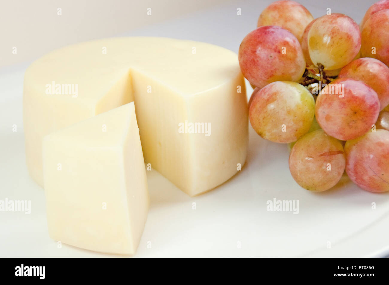 Portion of cheddar cheese hi-res stock photography and images - Alamy