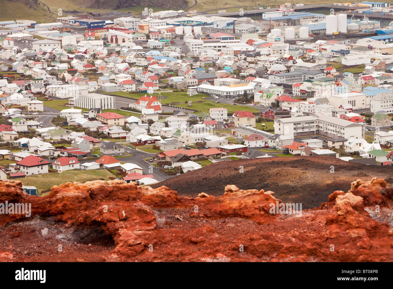 Heimaey town, Westman Islands, Iceland, with the volcano that nearly ...