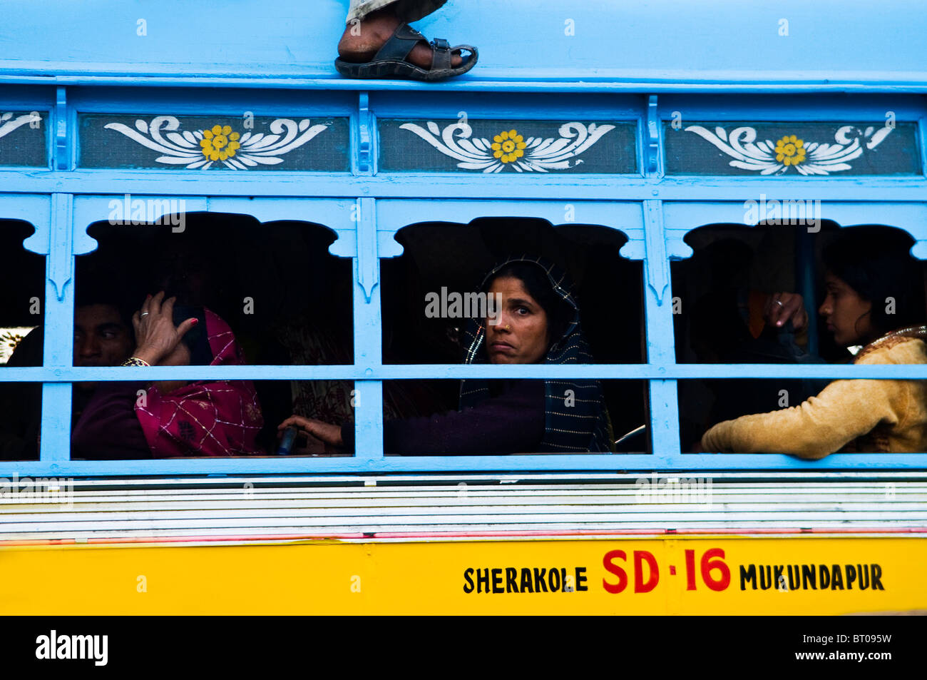 A colorful Indian blue bus Stock Photo - Alamy