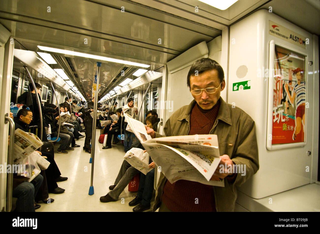 Daily scene inside a Chinese metro / subway train Stock Photo - Alamy
