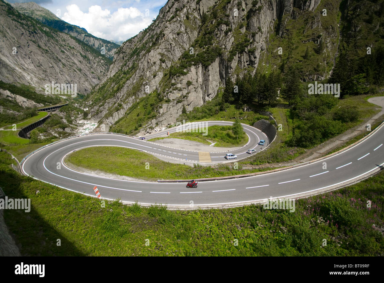 A very twisty Mountain Road in the Alps in Switzerland Stock Photo - Alamy