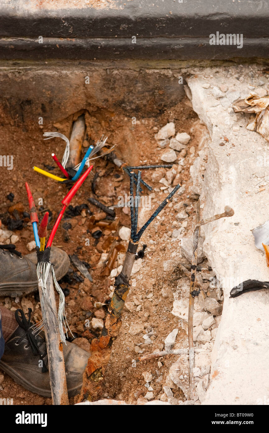 Underground steel armoured high voltage cable being isolated / cut and ...