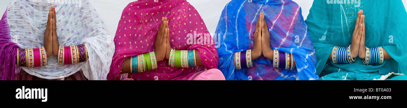 Indian girls namaste prayer hands. India. Panoramic Stock Photo - Alamy