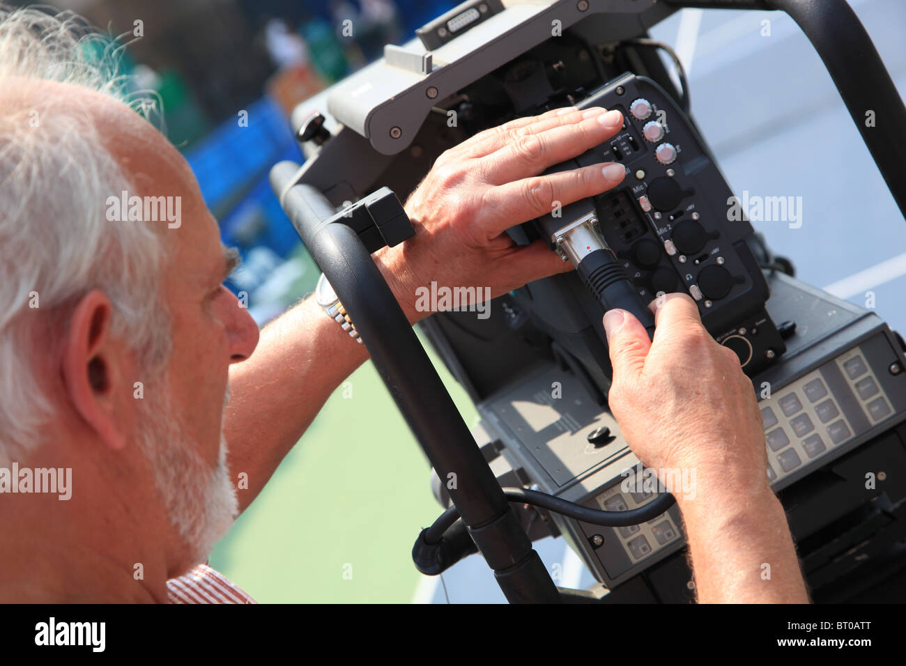 Male camera operator at the New Delhi Commonwealth Games 2010 Stock ...