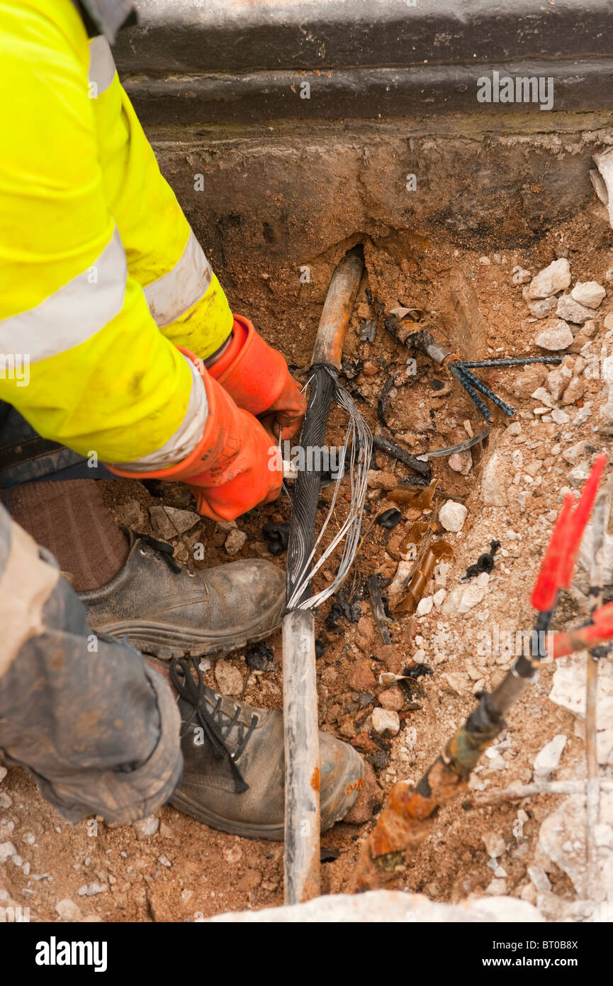 Underground steel armoured high voltage cable being isolated / cut and ...