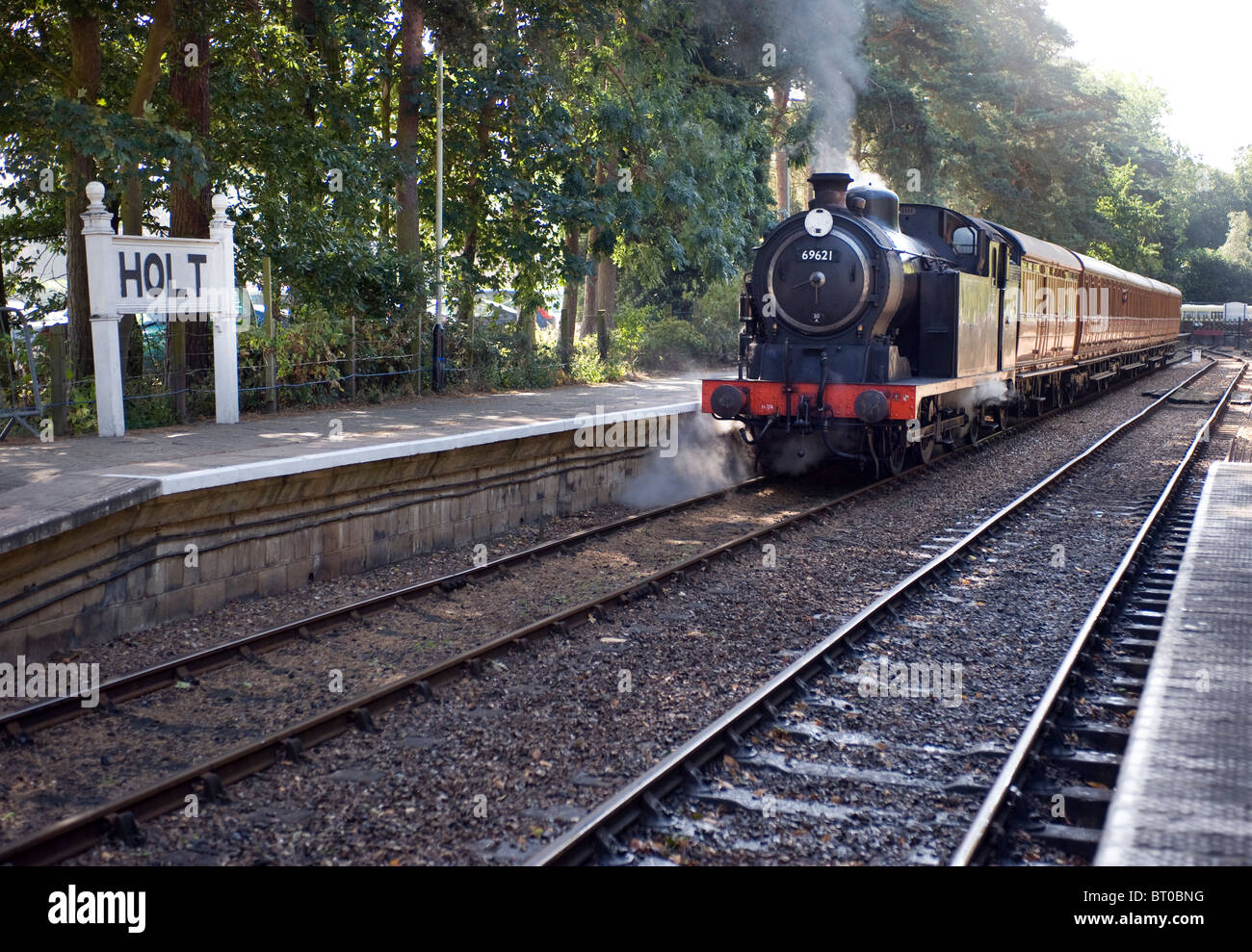 steam train waiting at holt station norfolk england Stock Photo - Alamy