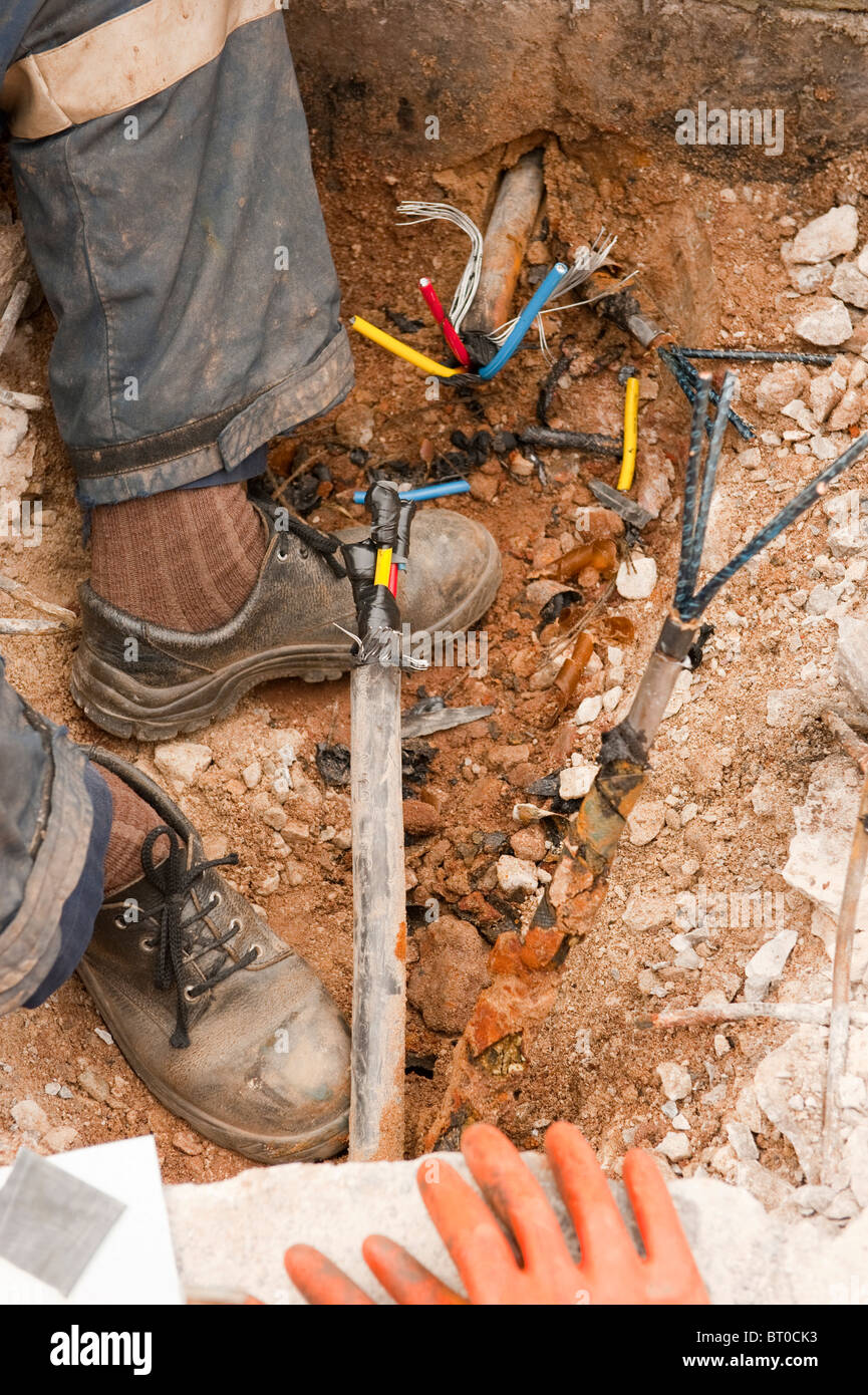Underground steel armoured high voltage cable being isolated / cut and ...