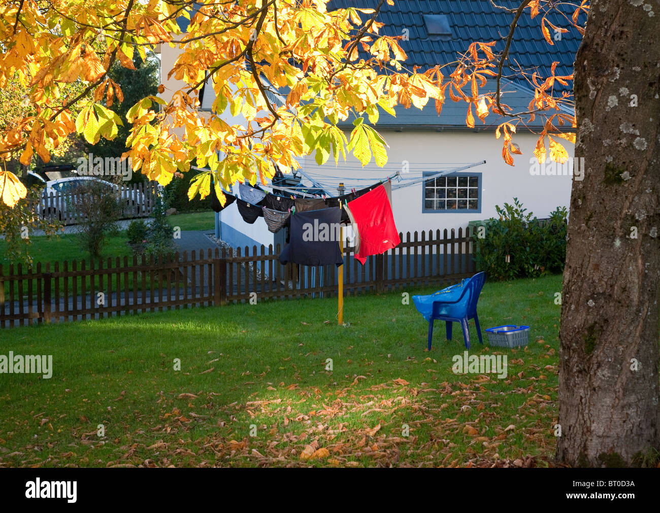 Washing drying in autumn sunlight Stock Photo - Alamy