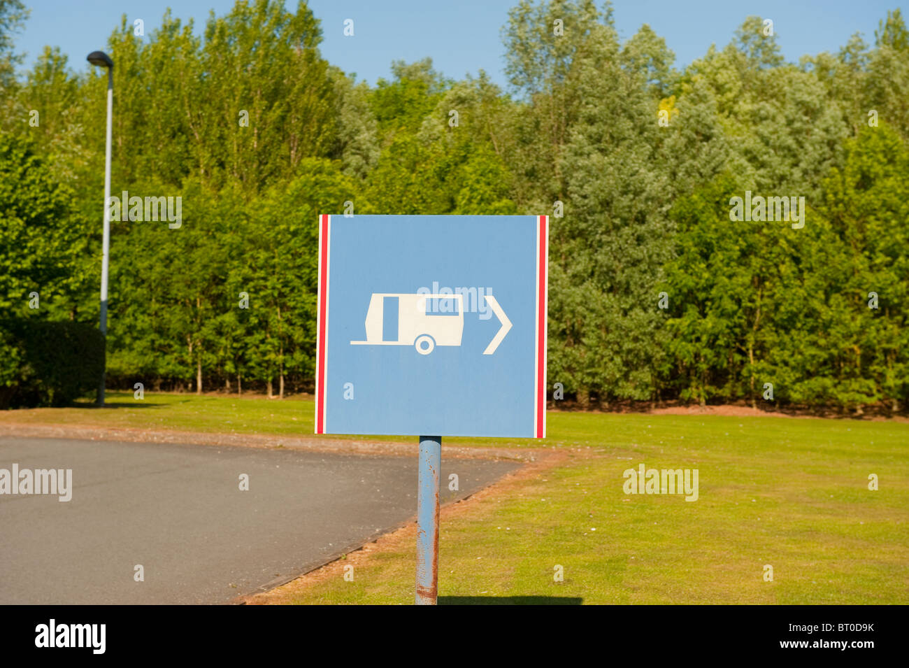 Caravan Parking Direction Sign at UK Motorway Services Stock Photo - Alamy