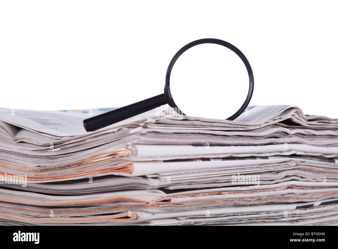 Reading newspaper magnifying glass hi-res stock photography and images ...