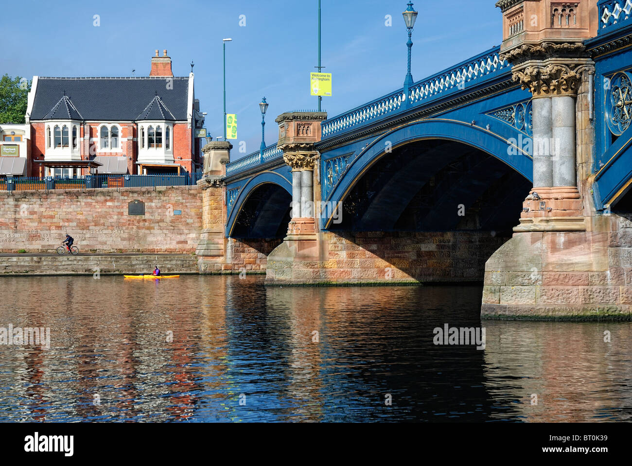 Reflections sunny city riverbank riverside cyclist landmark historic ...
