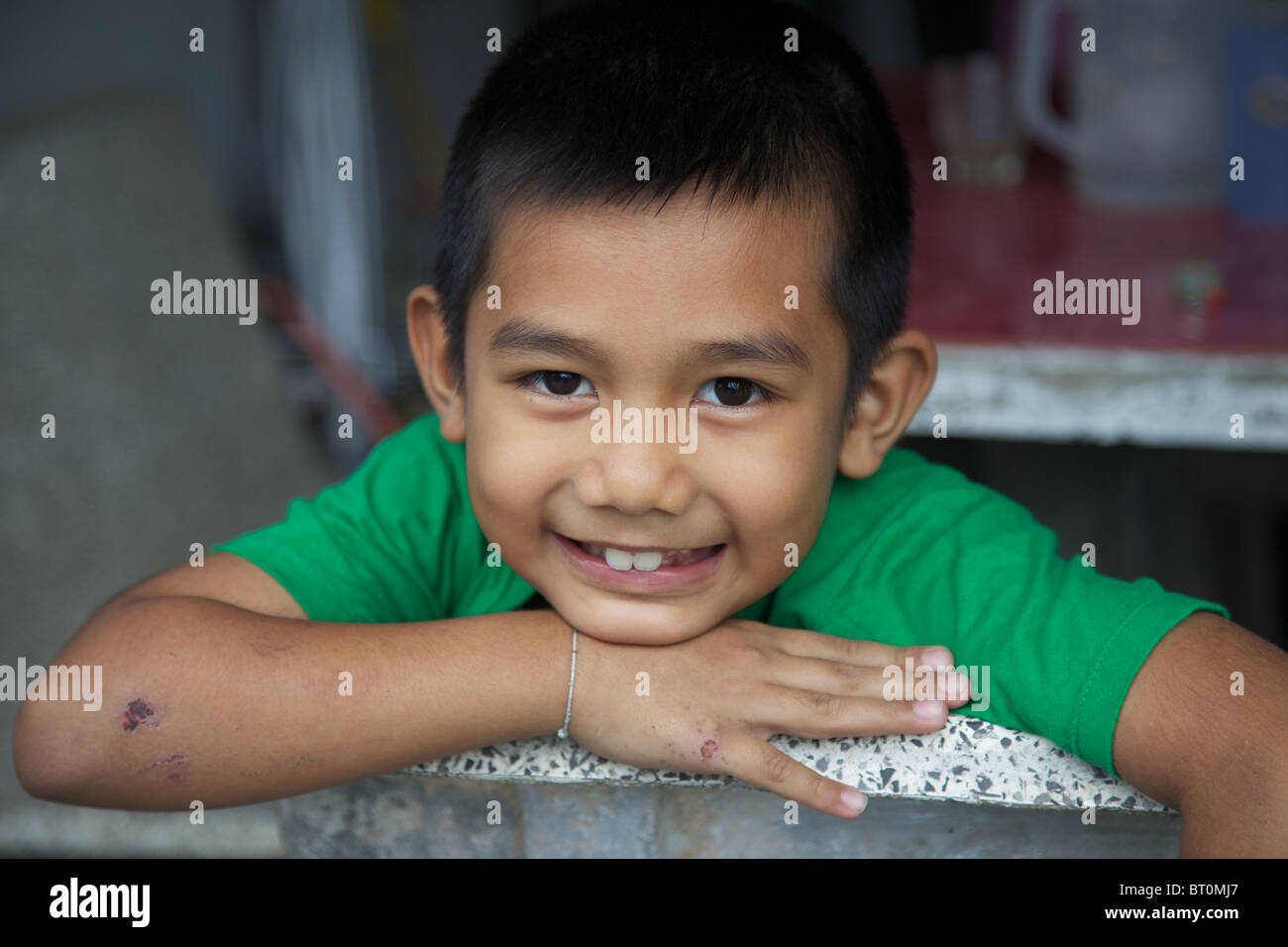 A young Thai Muslim boy looking at camera, Thailand Stock Photo - Alamy