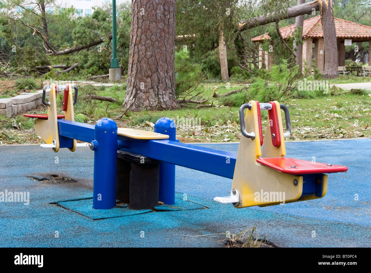 A old seesaw at a old playground Stock Photo - Alamy