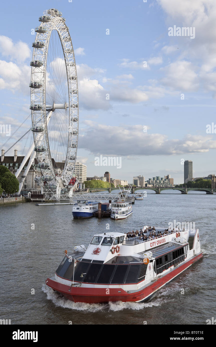 London, England, UK. Cruise boat on Thames river with view of the ...
