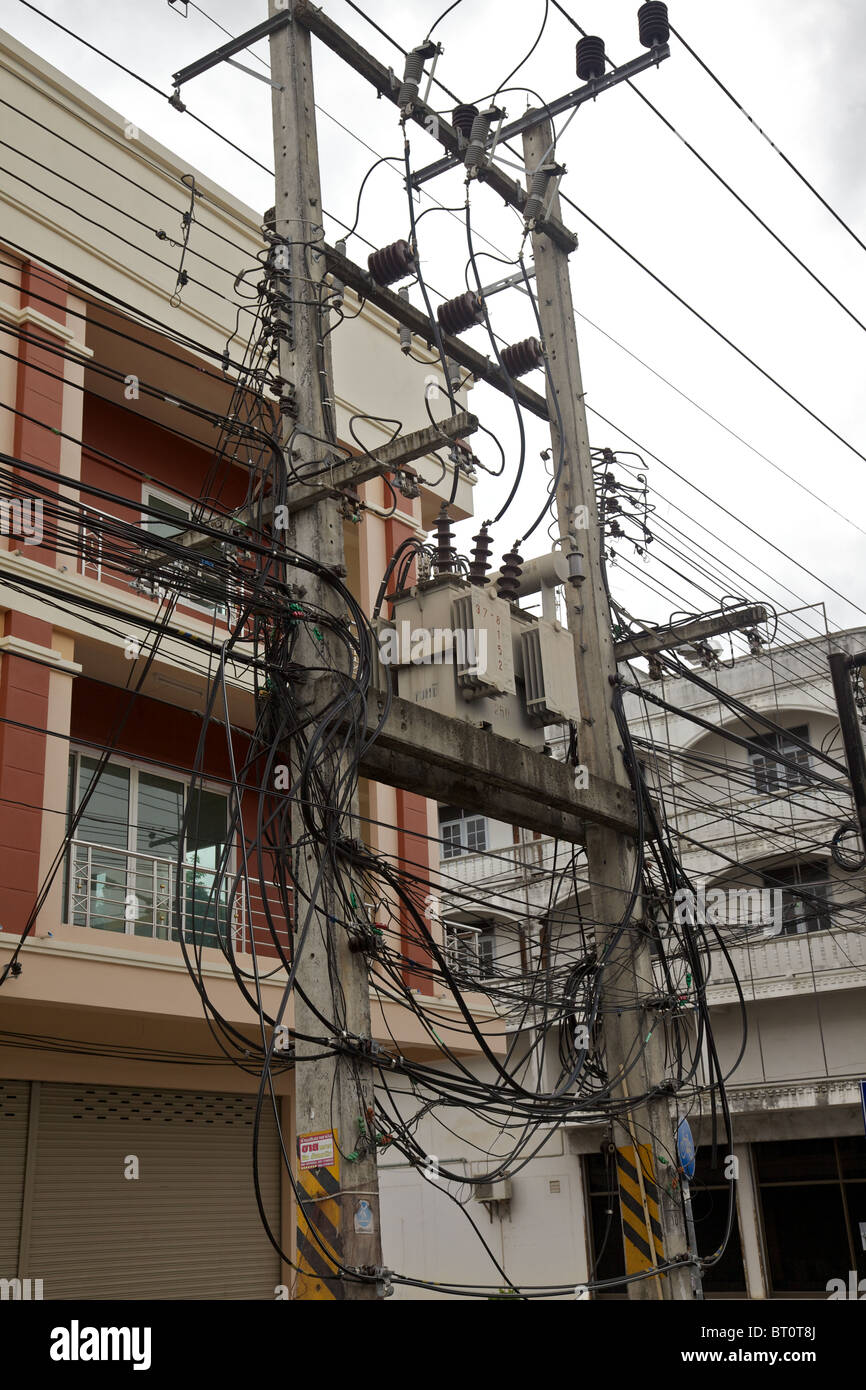 A cable nightmare in Thailand Stock Photo - Alamy