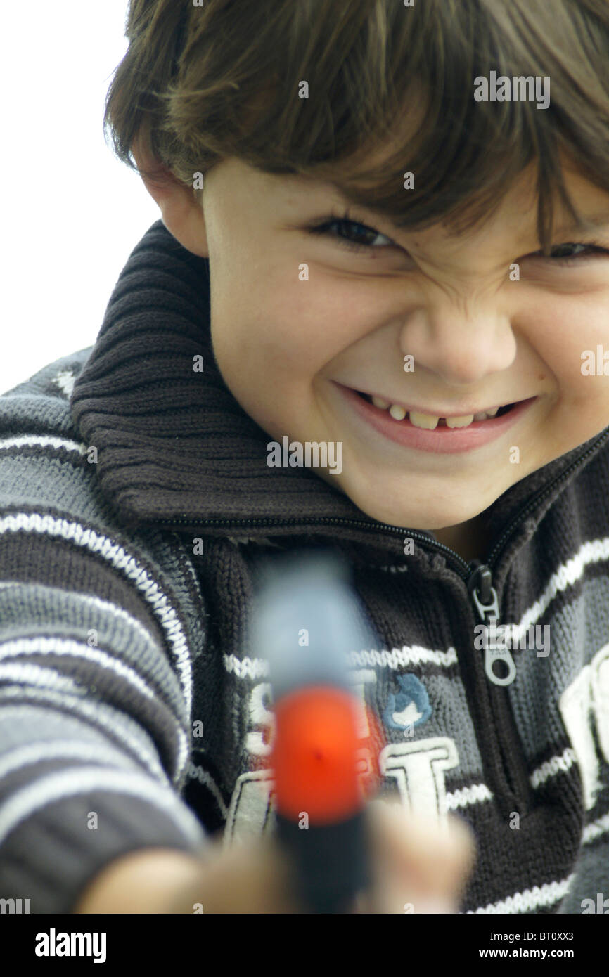 Boy with a gun hi-res stock photography and images - Alamy